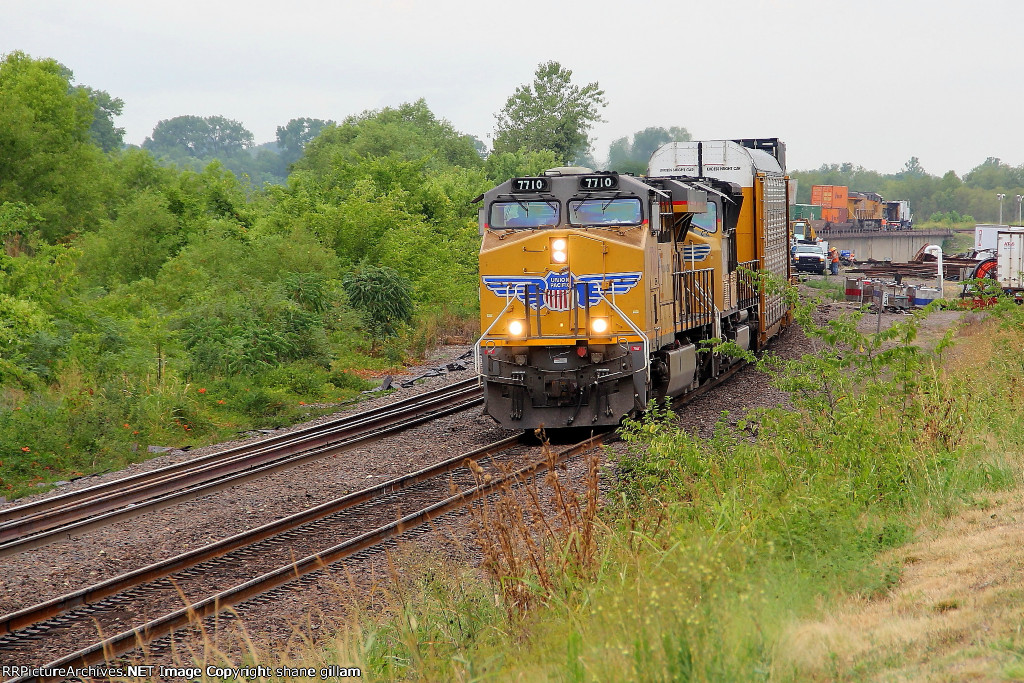 UP 7710 leads this stack around the curves of Chester ill.